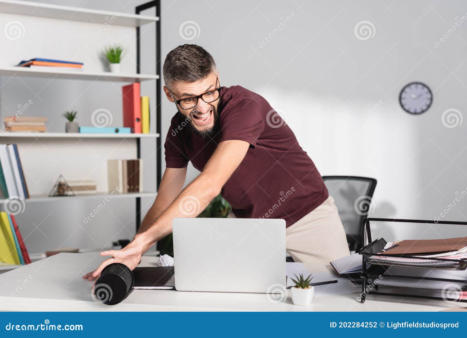 Businessman Throwing Laptop and Stationery from Stock Photo - Image of ...