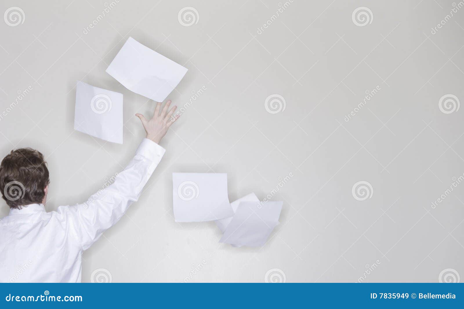 Businessman throwing paper stock image. Image of paper - 7835949