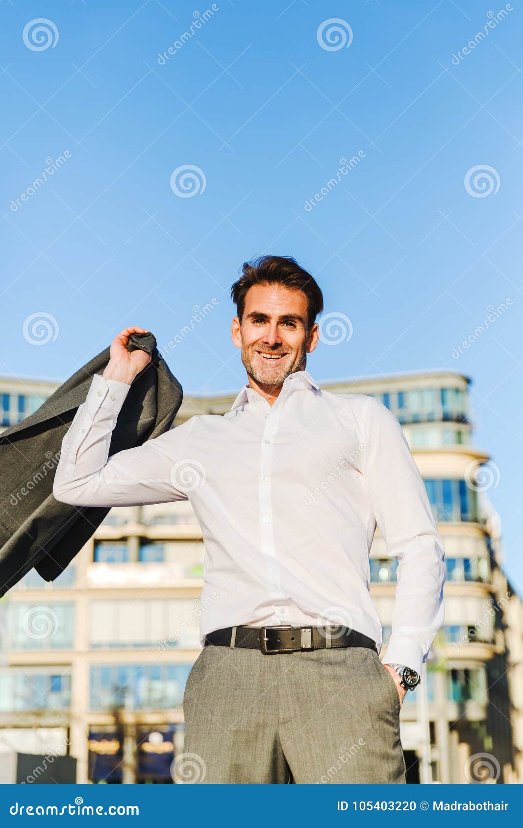 Businessman Throws His Jacket Over the Shoulder Stock Photo - Image of ...