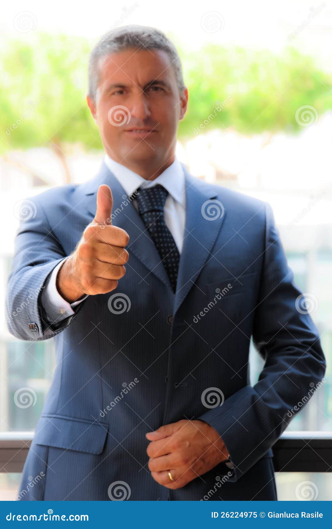 Businessman with thumbs up stock image. Image of business - 26224975