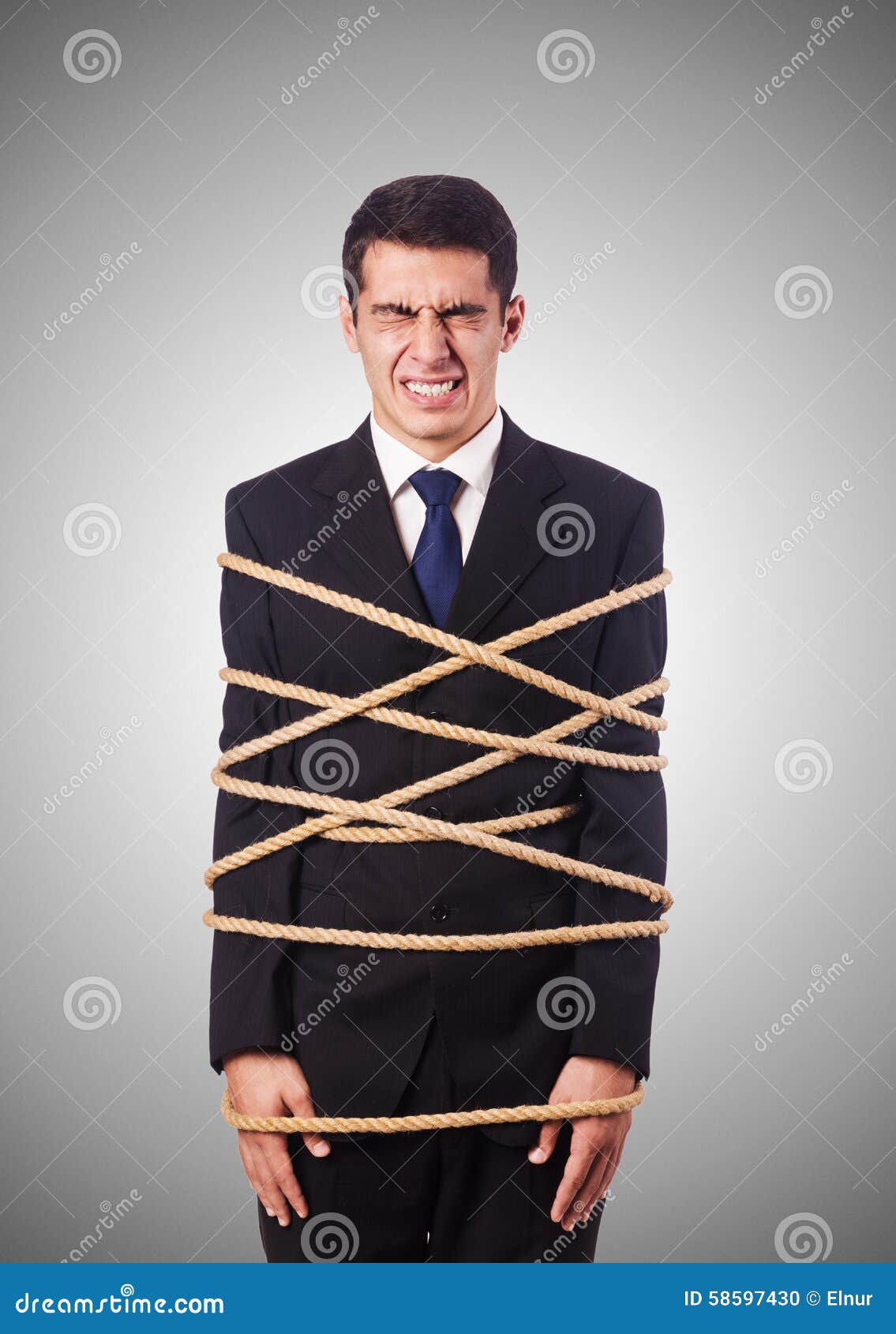 Businessman Tied Up with Rope Against Gradient Stock Photo - Image of ...