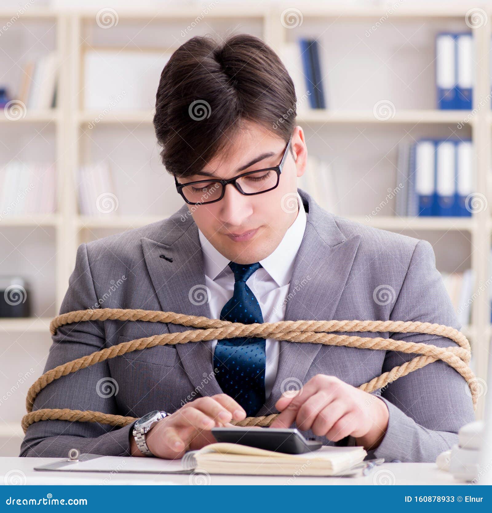 Businessman Tied Up with Rope in Office Stock Image - Image of gold ...
