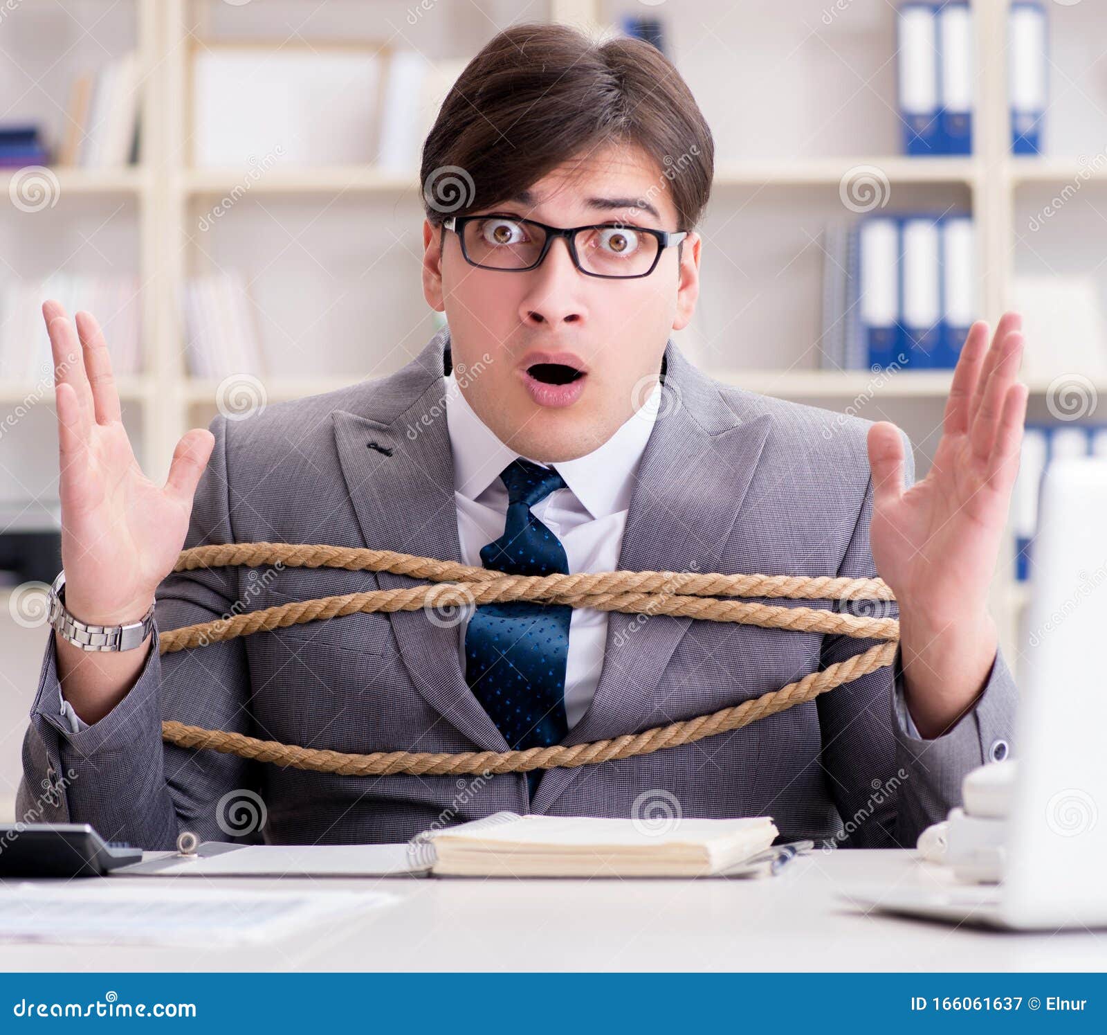 Businessman Tied Up with Rope in Office Stock Image - Image of concept ...