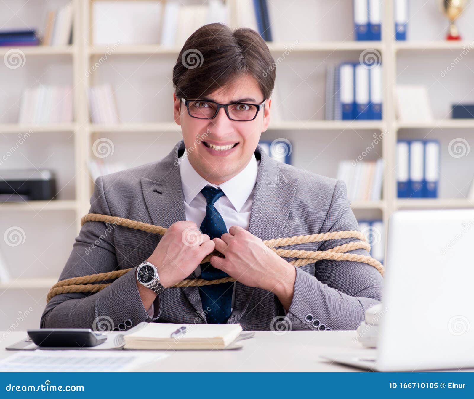 Businessman Tied Up with Rope in Office Stock Image - Image of overtime ...