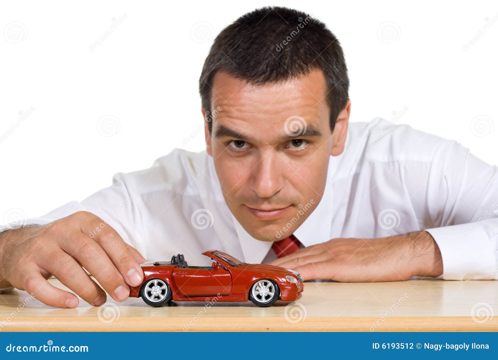 Businessman with Toy Car - Isolated Stock Photo - Image of dreaming ...
