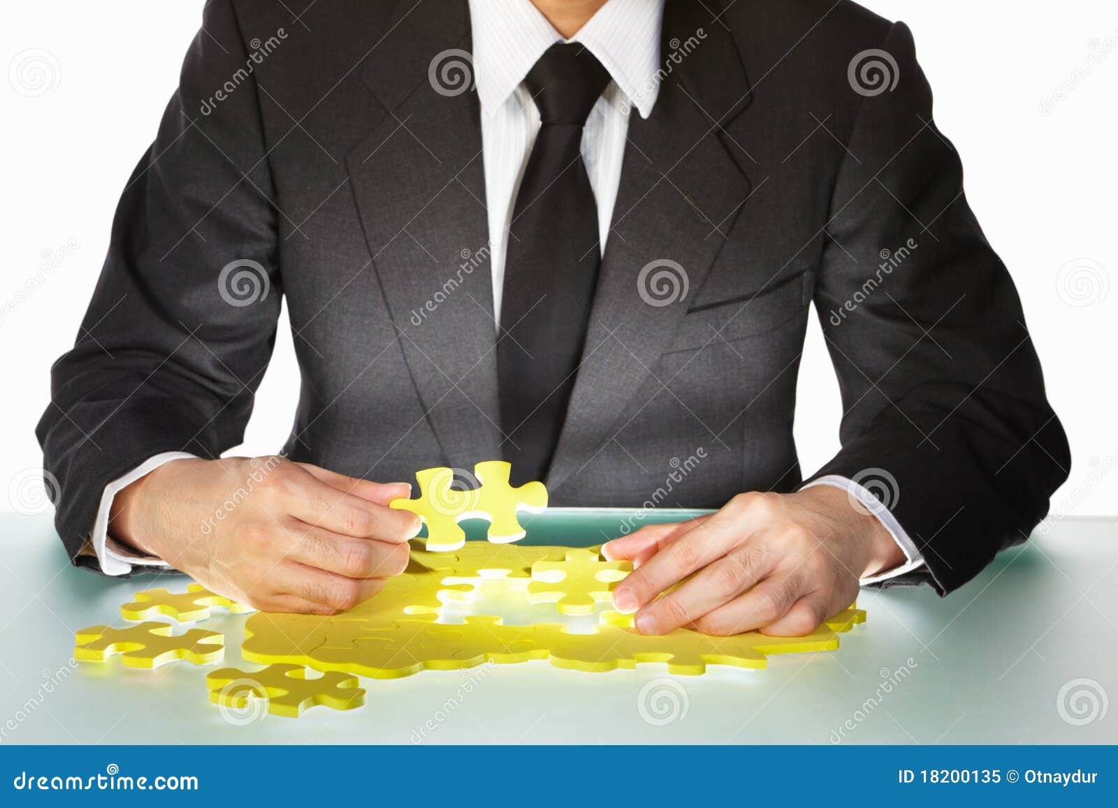Businessman Trying To Finish the Puzzle Stock Image - Image of holding ...