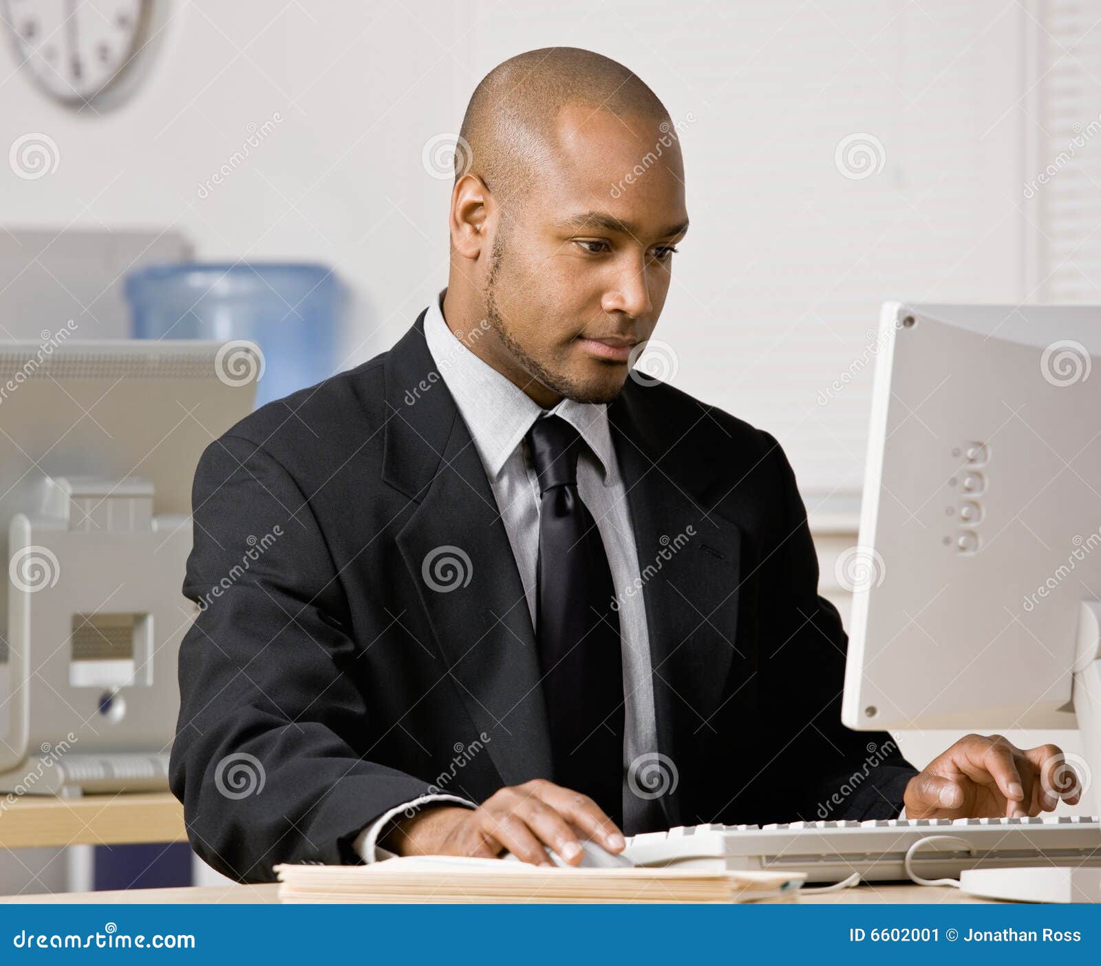 Businessman Typing on Computer at Desk Stock Image - Image of typing ...