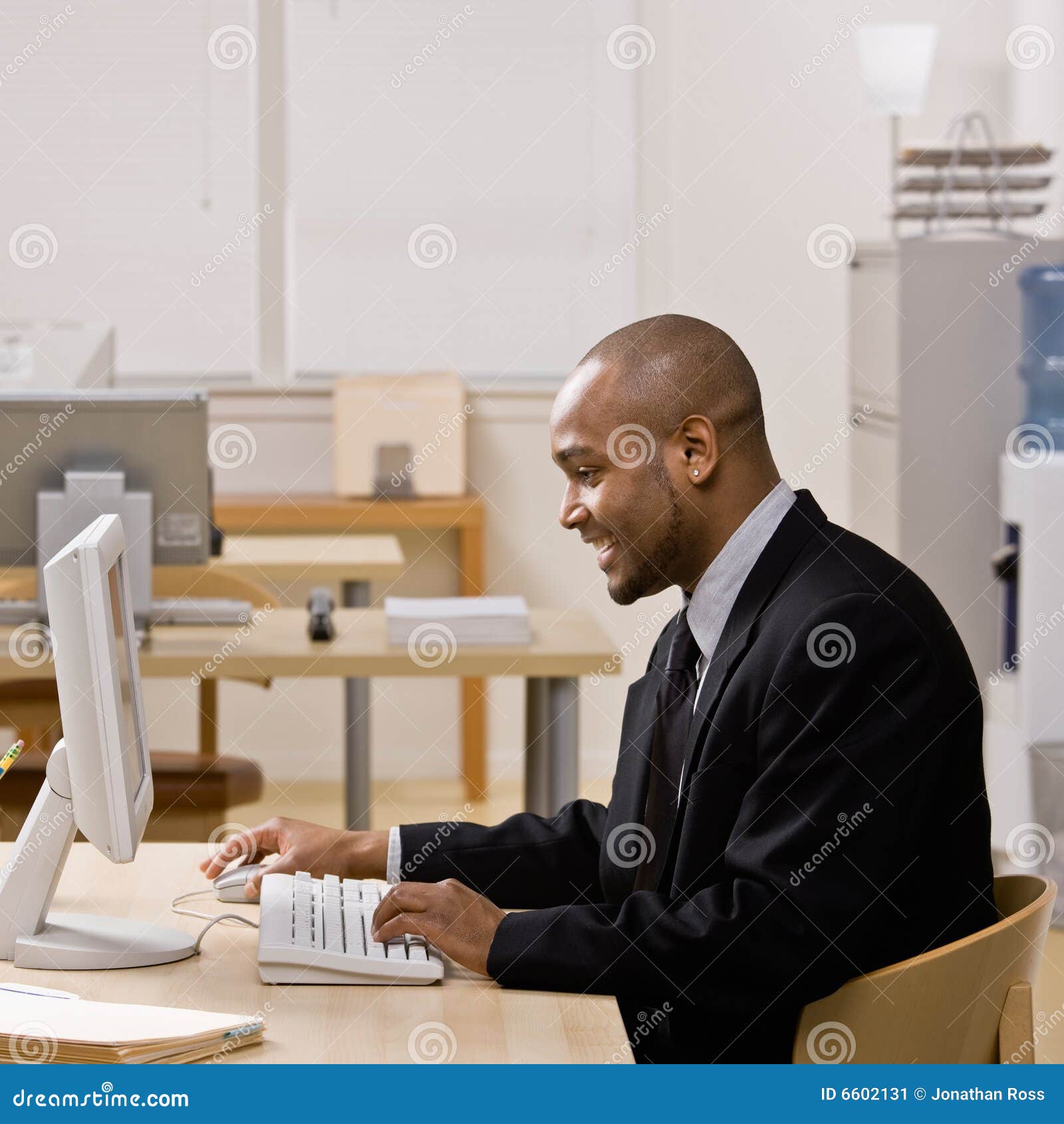 Businessman Typing on Computer at Desk Stock Image - Image of confident ...