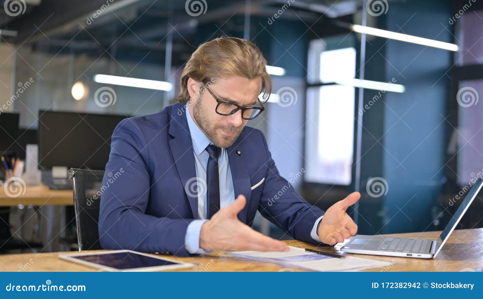 Businessman Upset while Reading Documents, Report Stock Photo - Image ...