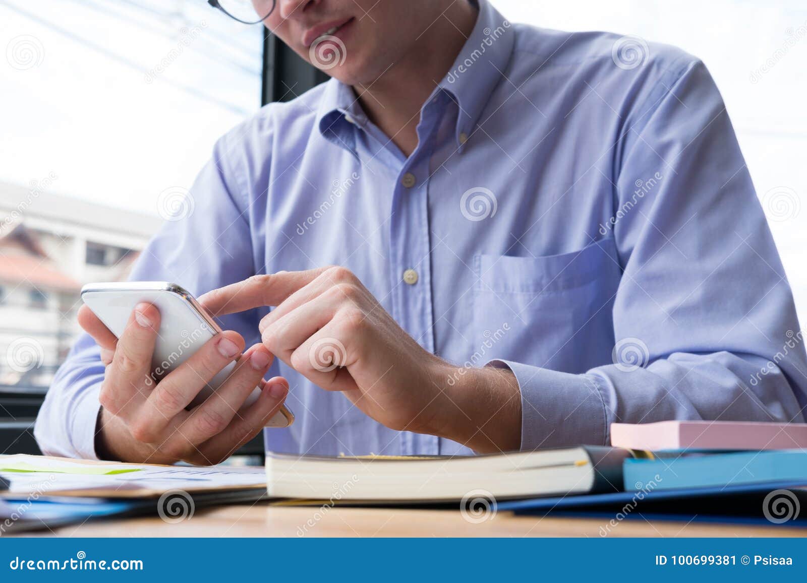 Businessman Use Mobile Phone at Workplace. Man Texting Message O Stock ... Businessman Use Mobile Phone at Workplace. Man Texting Message O Stock ...