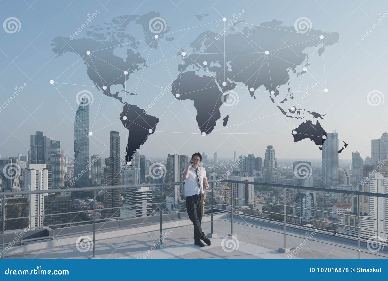 Businessman Use Smartphone on Rooftop of Building with Technology ...