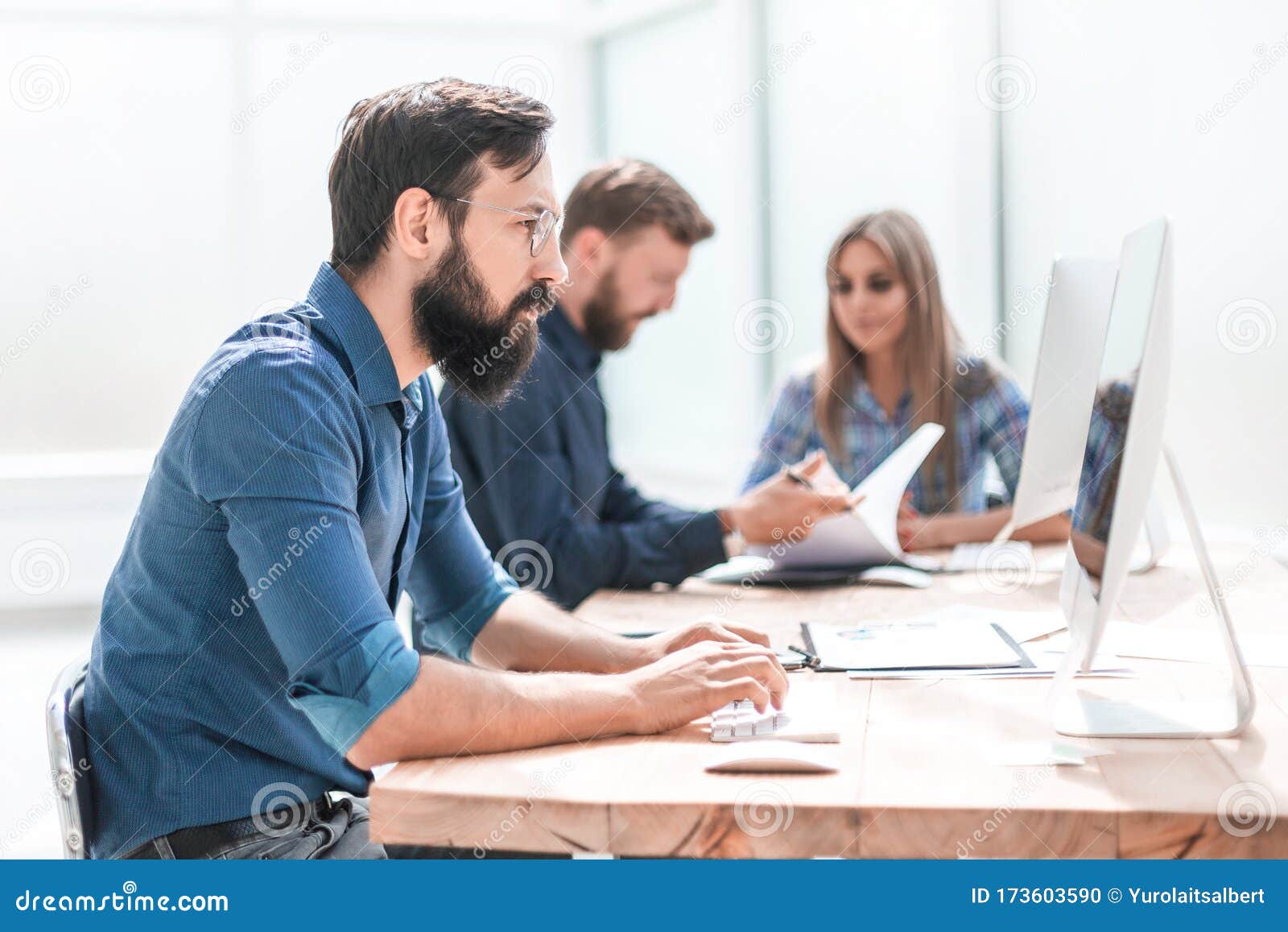 Businessman Uses a Computer in the Workplace in the Office. Stock Photo ...