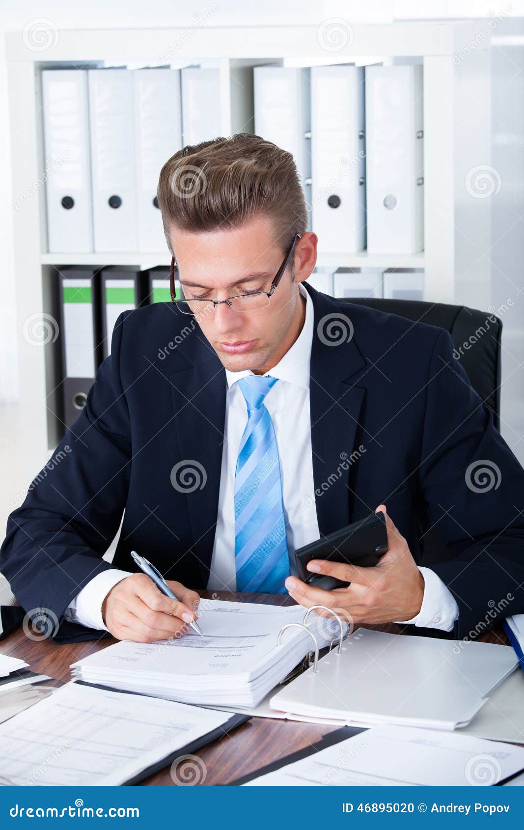 Businessman Using Calculator Stock Photo - Image of businesspeople ...