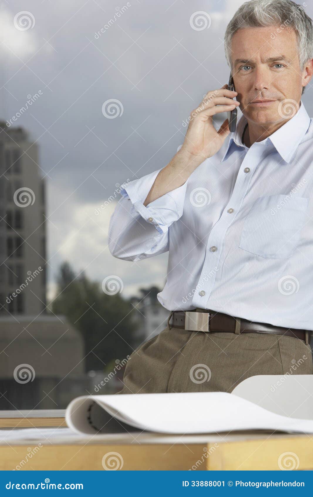 Businessman Using Cellphone in Office Stock Image - Image of portrait ...