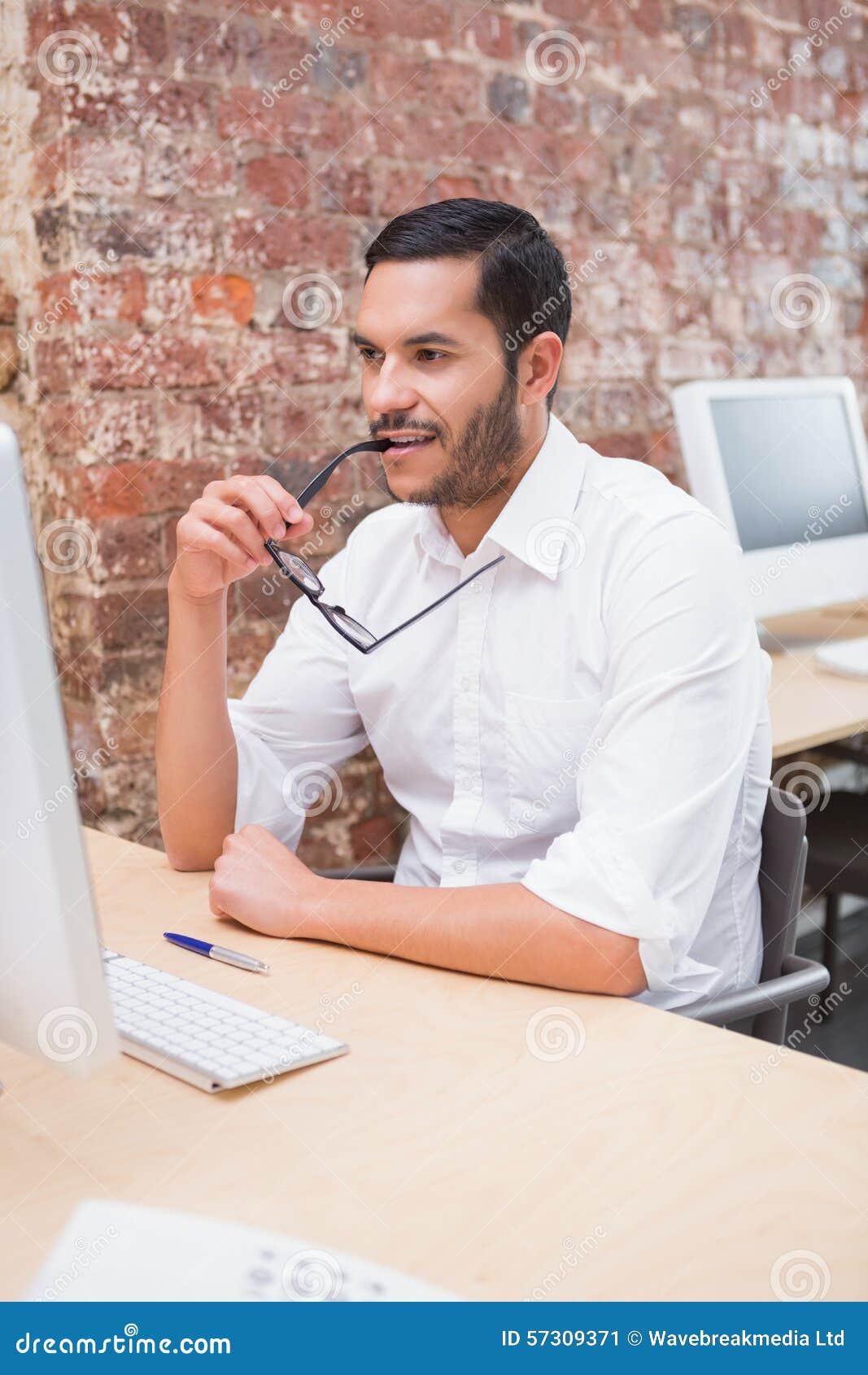 Businessman Using Computer at Desk Stock Image - Image of happy ...