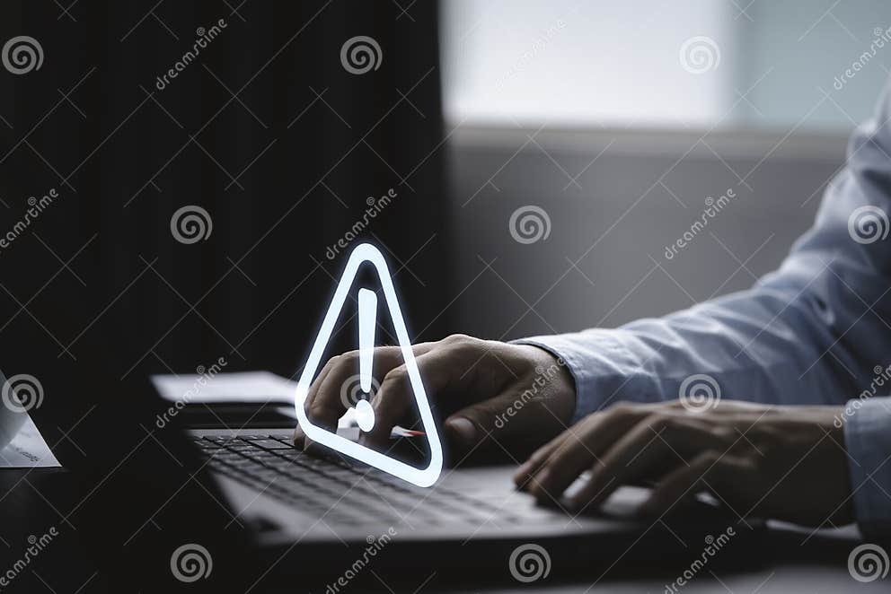 Businessman Using Computer Laptop with Triangle Caution Warning Sing ...