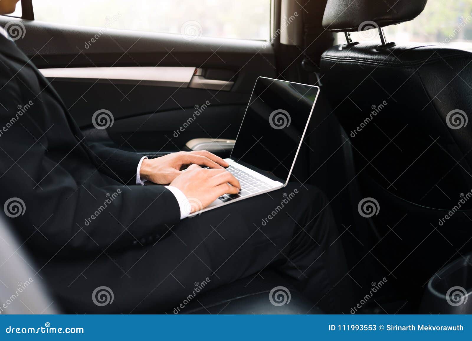 Businessman Using Computer Working Car Inside Stock Image - Image of ...