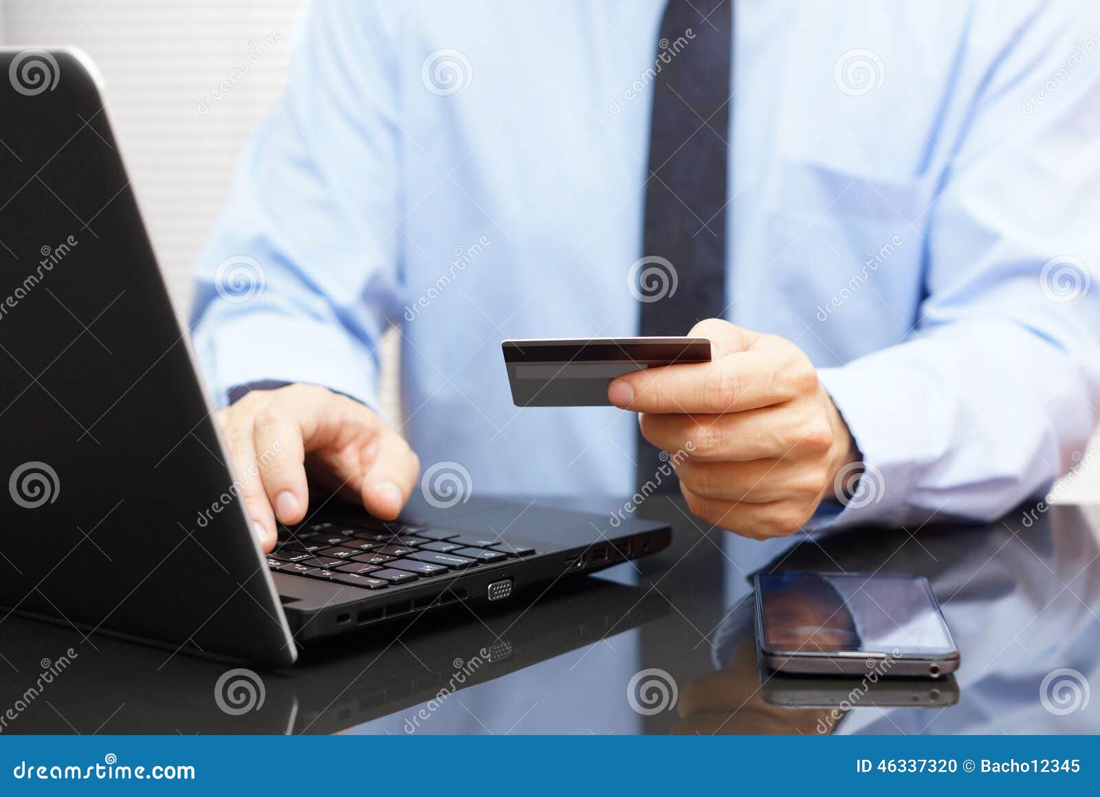 Businessman is Using Credit Card for on Line Payment on Laptop Stock ...