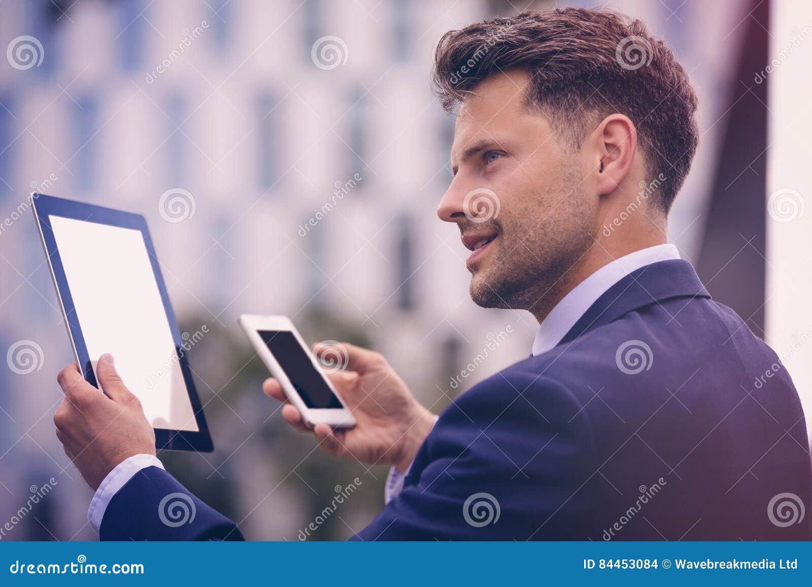Businessman Using Digital Tablet and Mobile Phone Stock Photo - Image ...
