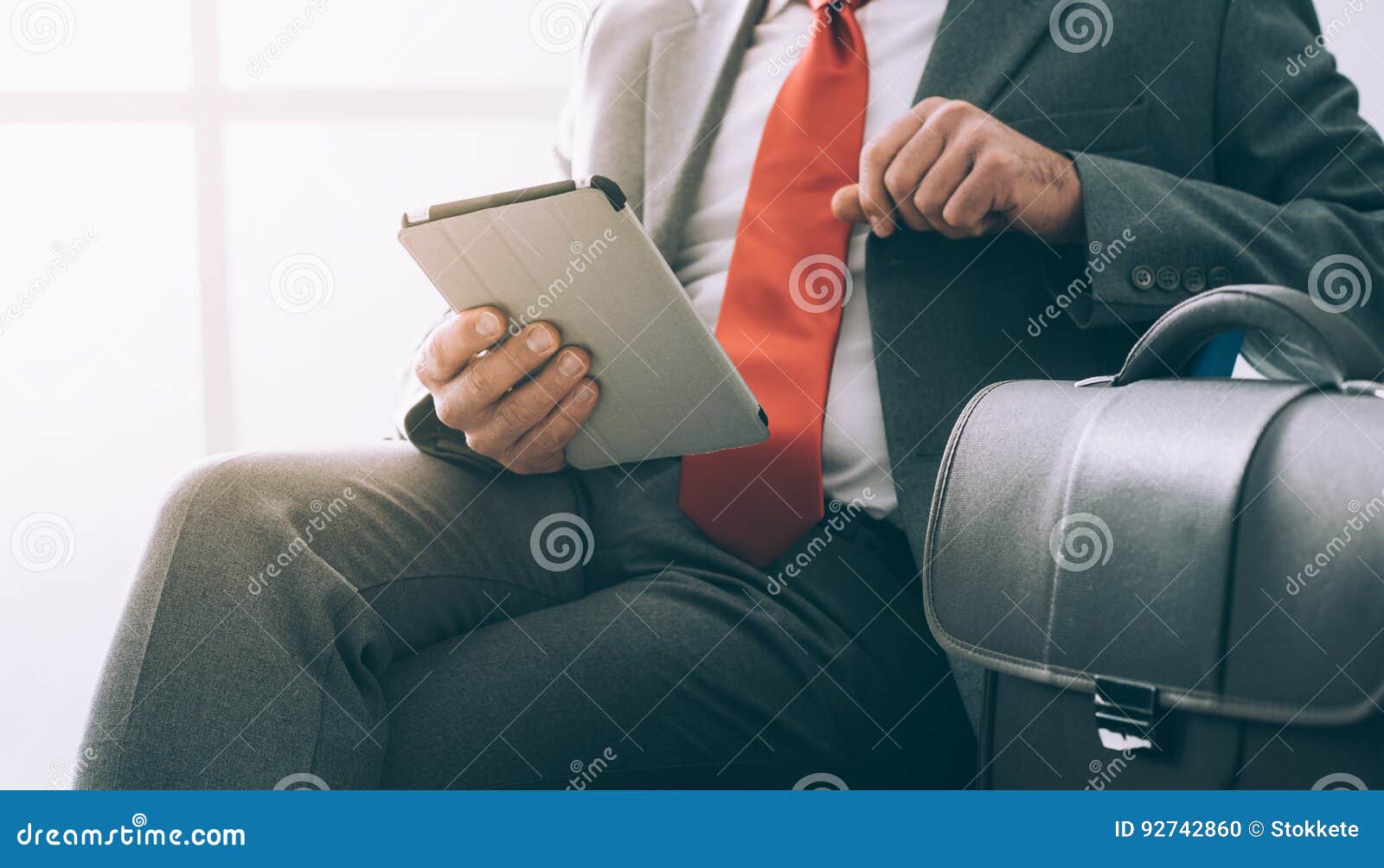 Businessman Using a Digital Tablet Stock Photo - Image of consultant ...