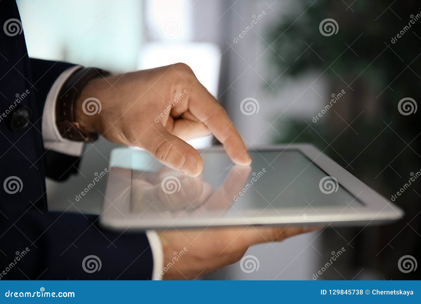 Businessman Using Digital Tablet at Workplace Stock Photo - Image of ...