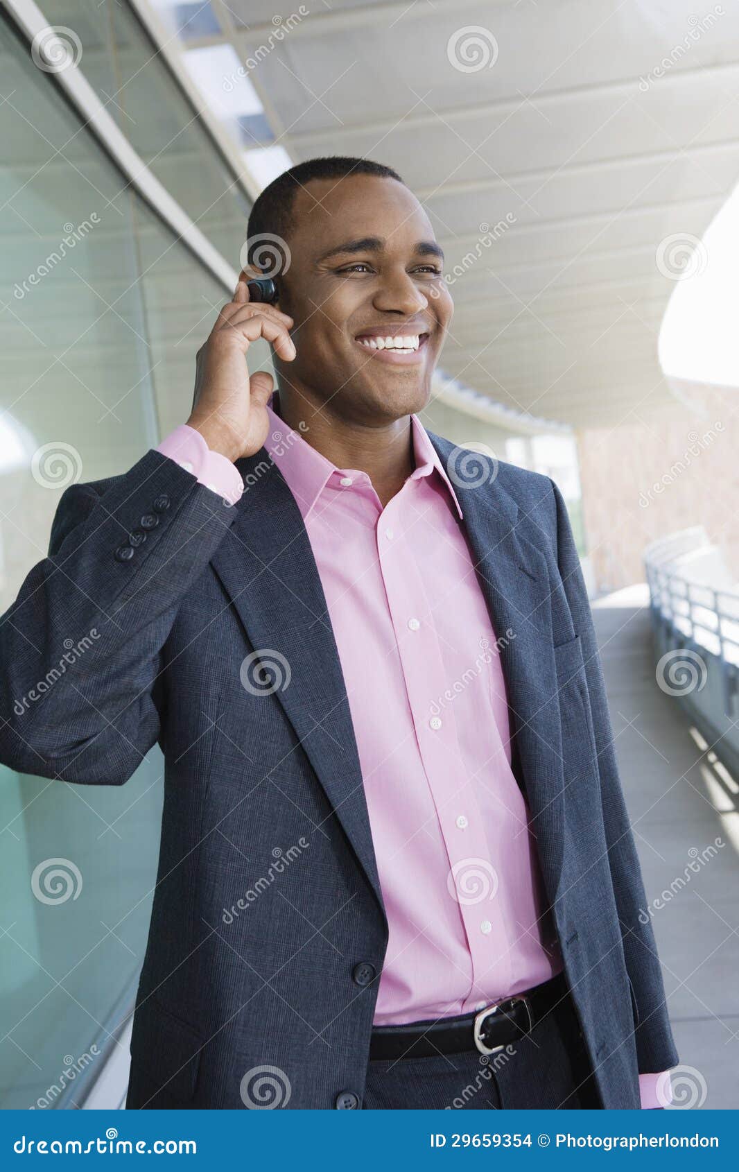Businessman Using Hands Free Device Stock Photo - Image of bluetooth ...