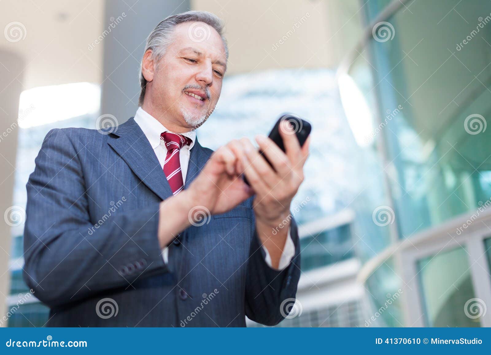 Businessman Using His Smartphone Stock Photo - Image of searching ...