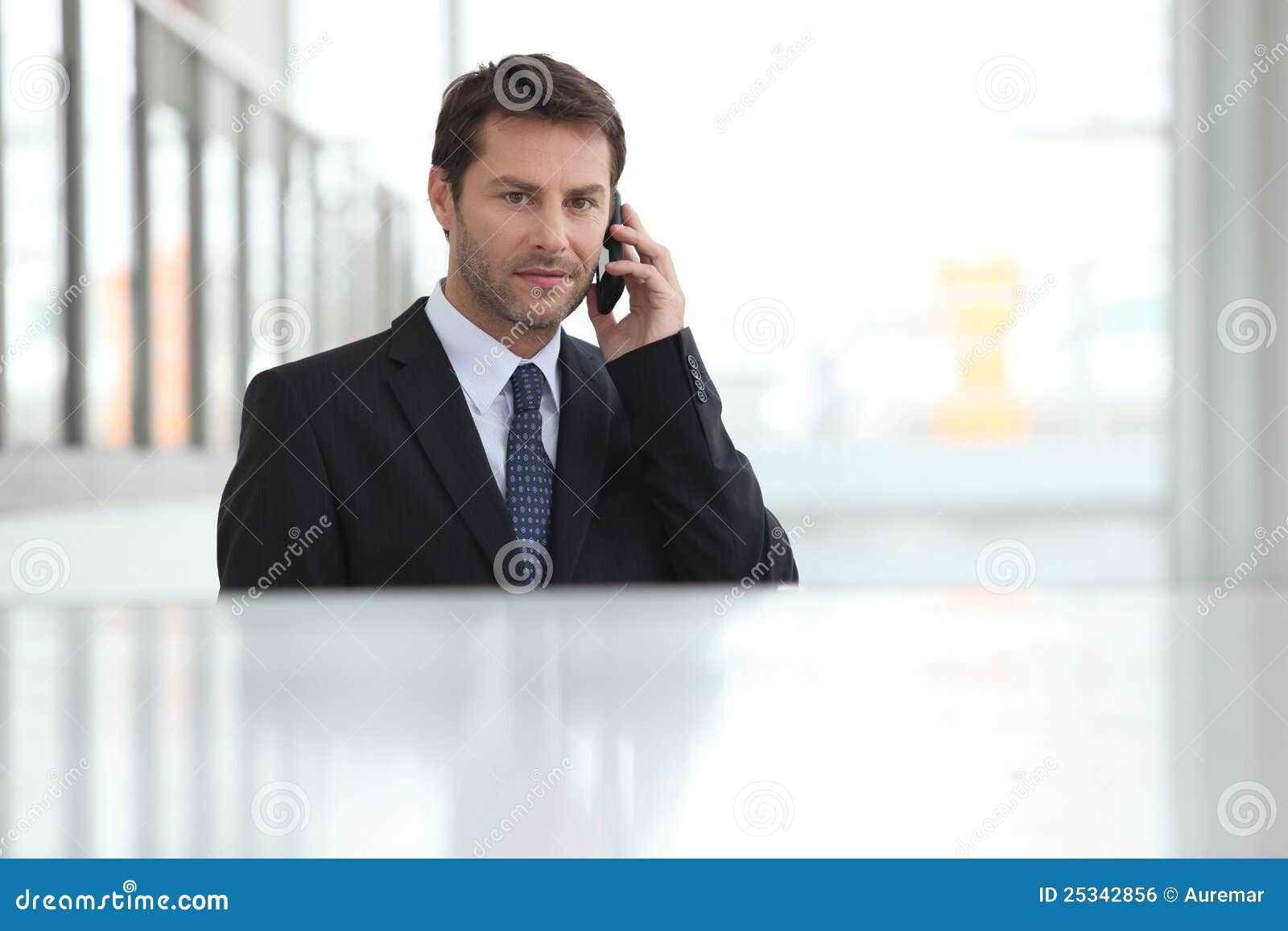 Businessman Using His Telephone Stock Photo - Image of standing ...