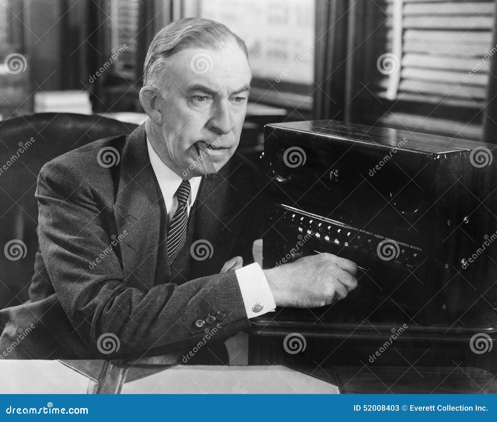 Businessman using intercom stock image. Image of businessman - 52008403