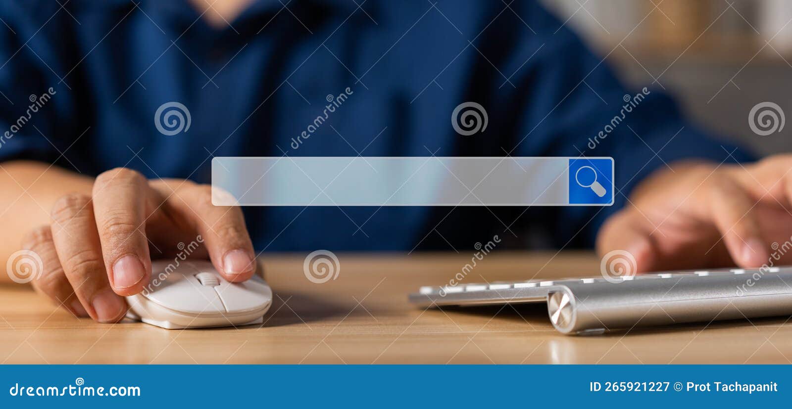 Businessman Using a Keyboard and Notebook for Searching Information on ...