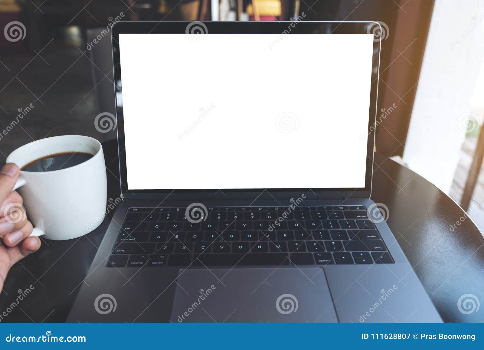 A Businessman Using Laptop with Blank White Desktop Screen while ...