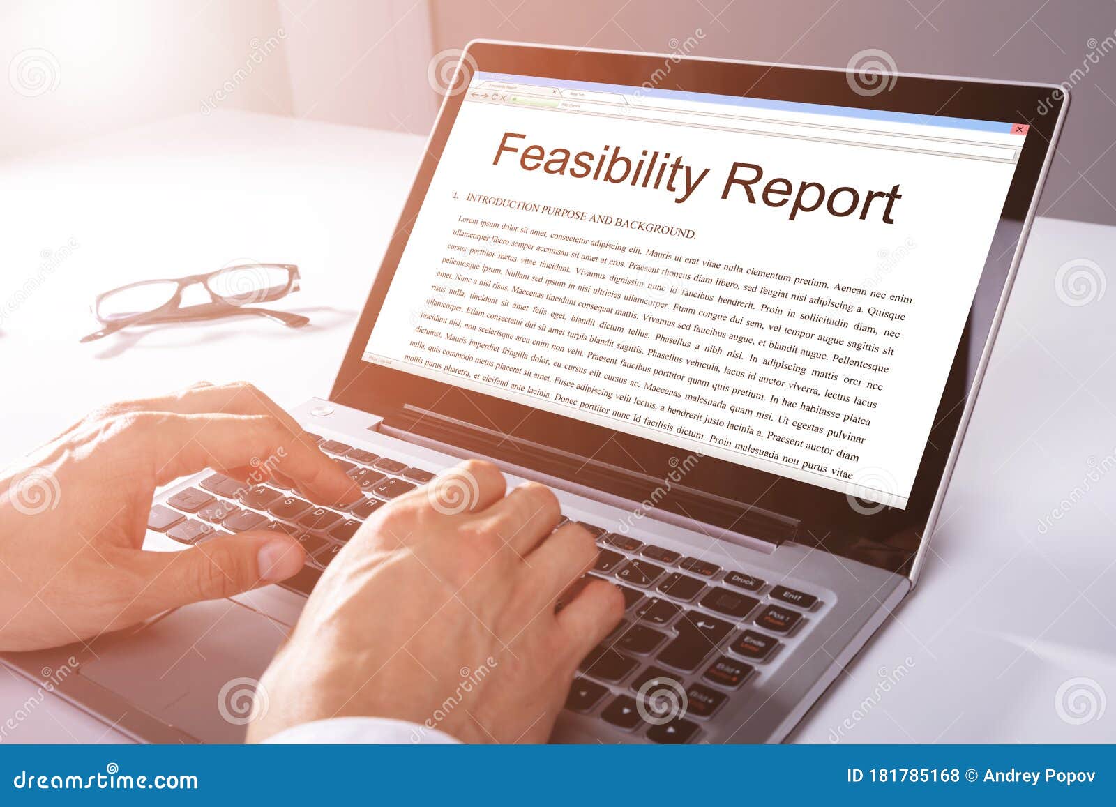 Man Typing Feasibility Report on Laptop Stock Photo - Image of people ...
