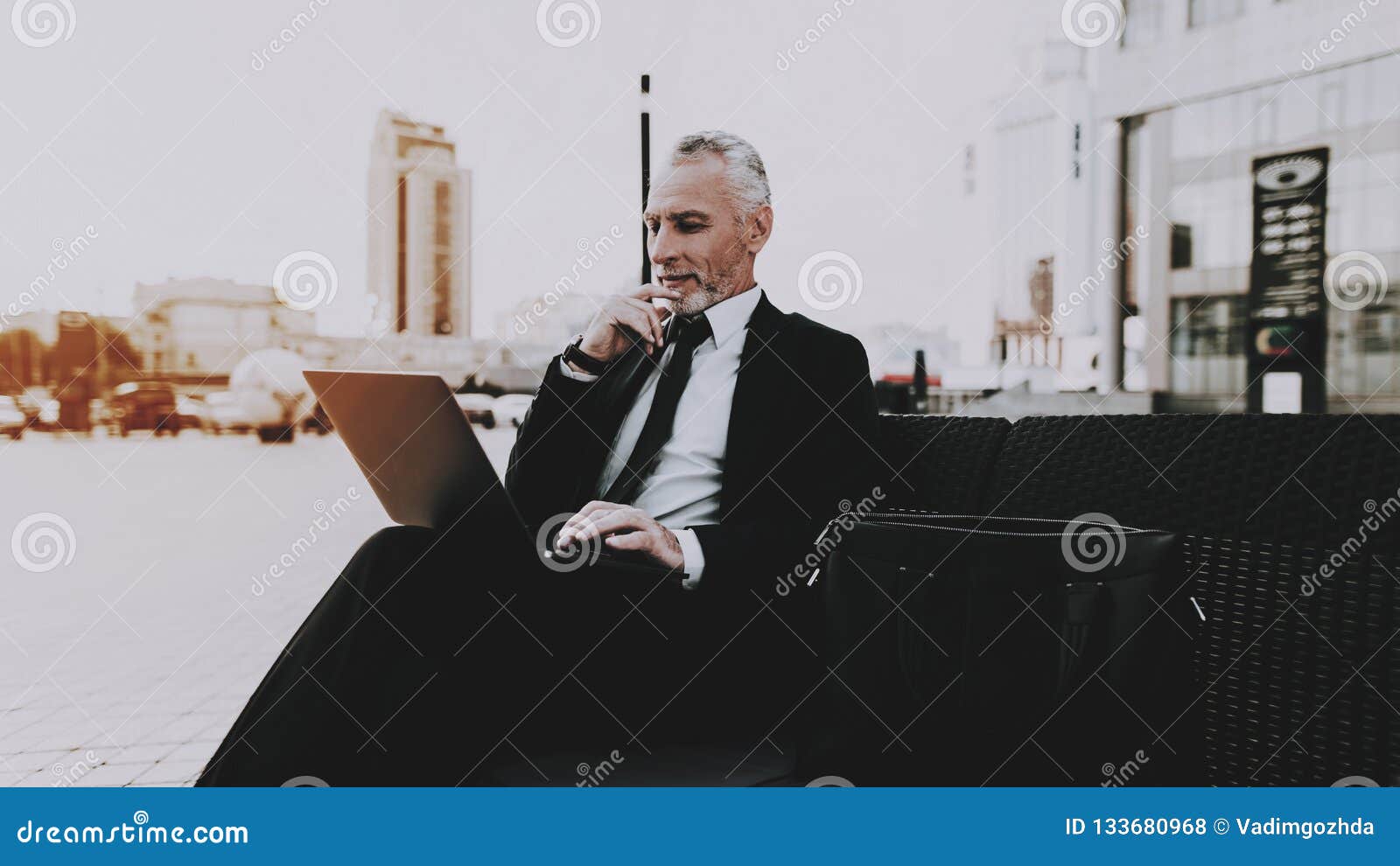 Businessman is Using a Laptop Computer. Stock Photo - Image of ... Businessman is Using a Laptop Computer. Stock Photo - Image of ...