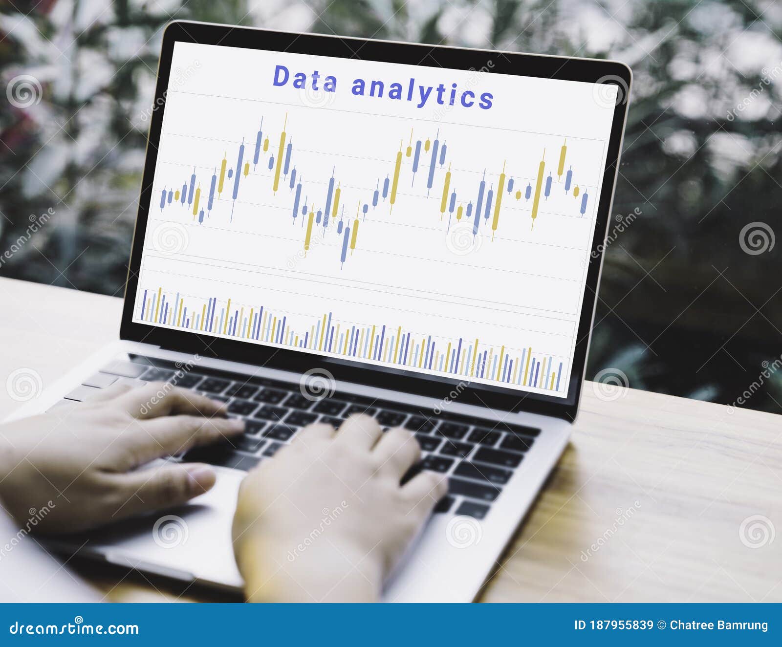 Businessman Using a Laptop Computer with Data Analytics and Statistics ...