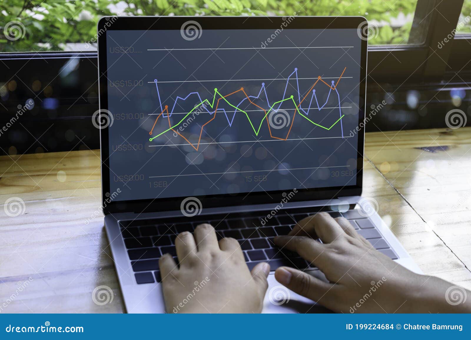 Businessman Using a Laptop Computer with Data Analytics and Statistics ...