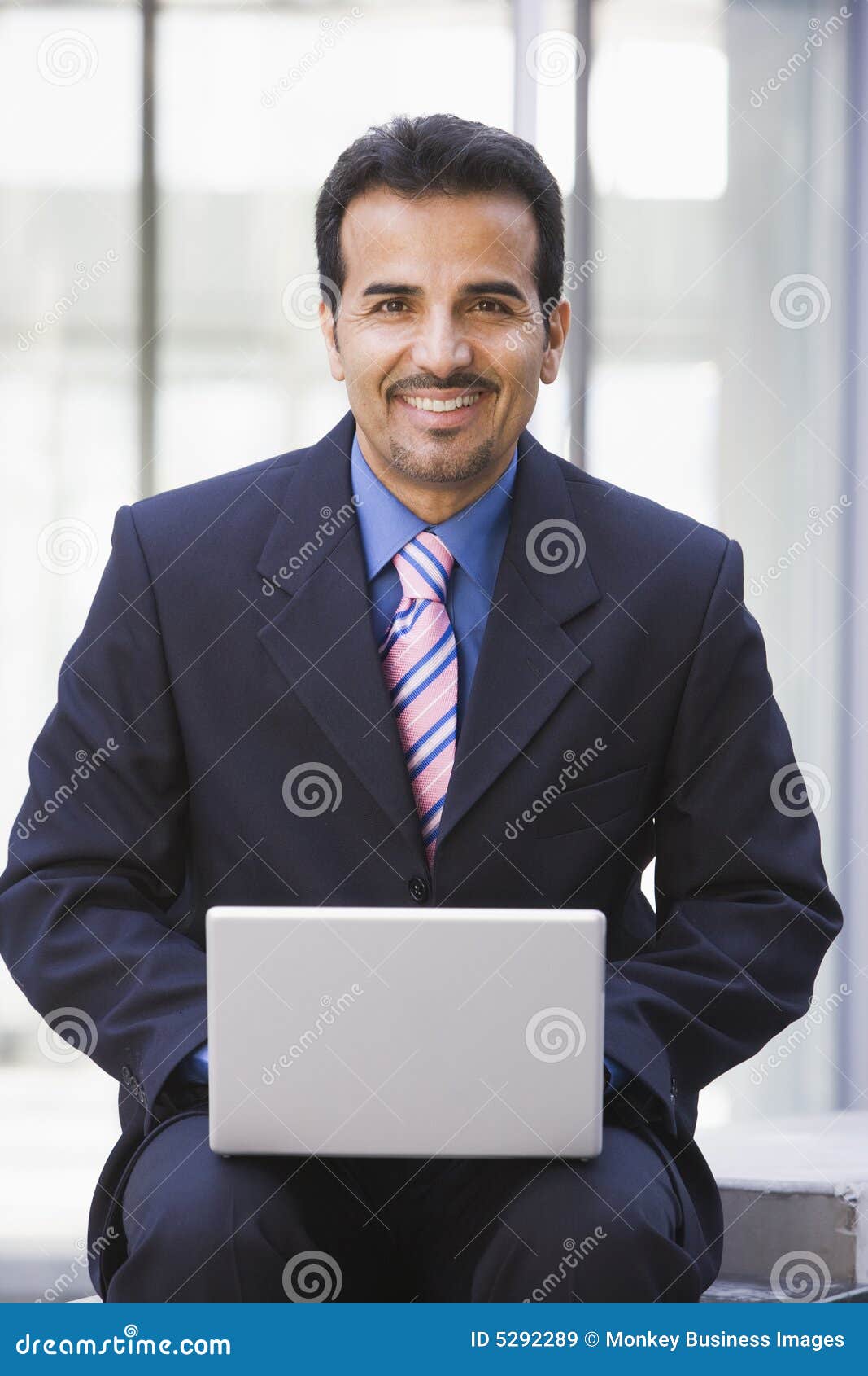 Businessman Using Laptop Computer Outside Stock Image - Image of ...