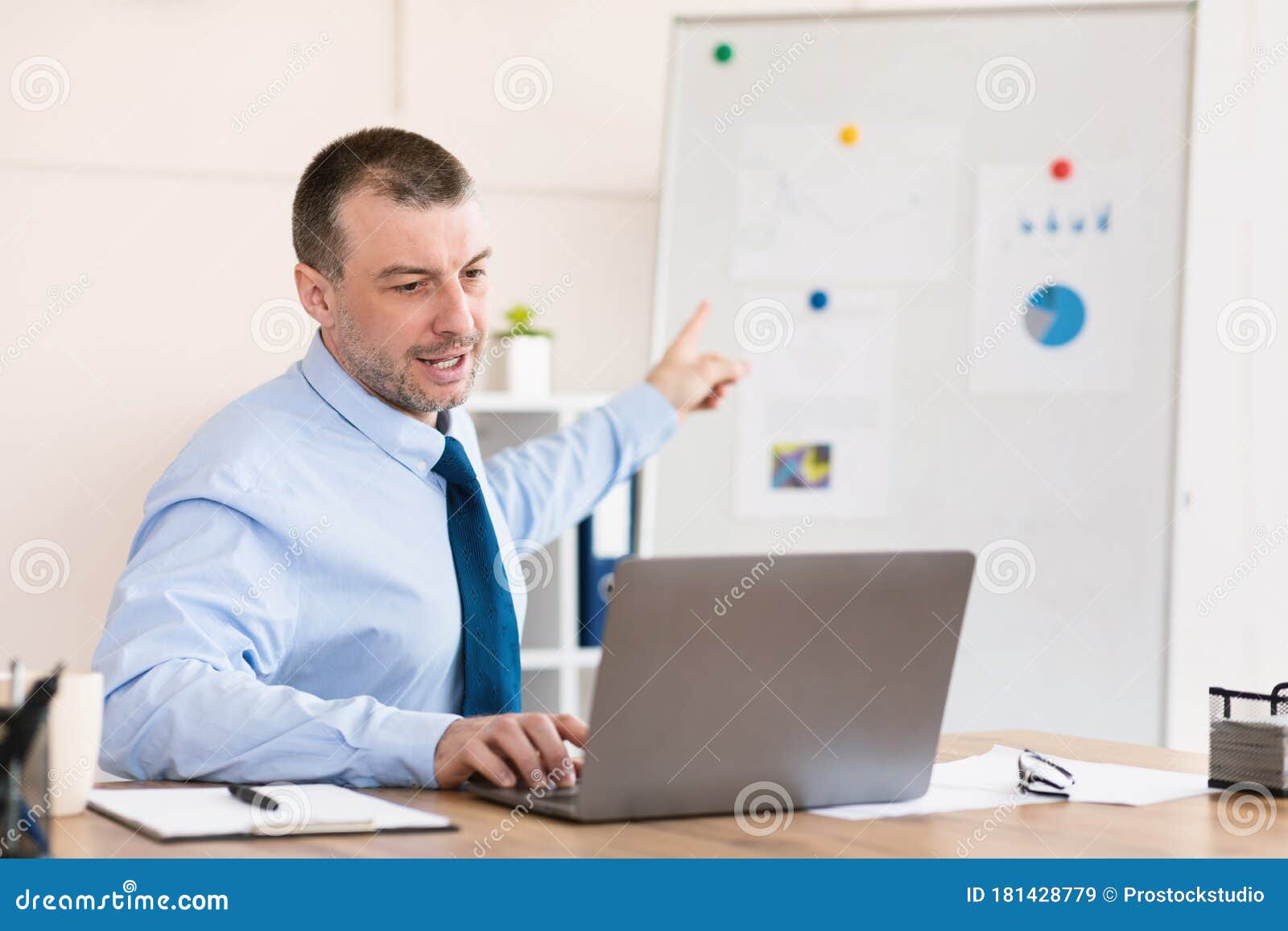 Businessman Using Laptop Making Video Conference Presentation Sitting ...