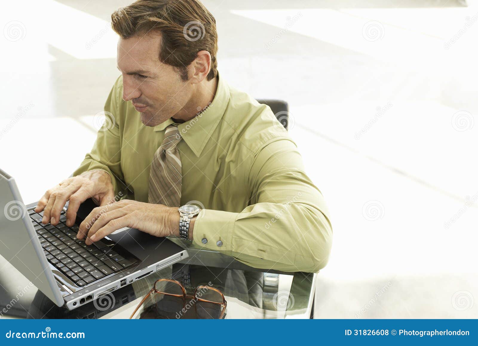 Businessman Using Laptop in Office Stock Photo - Image of smart, laptop ...