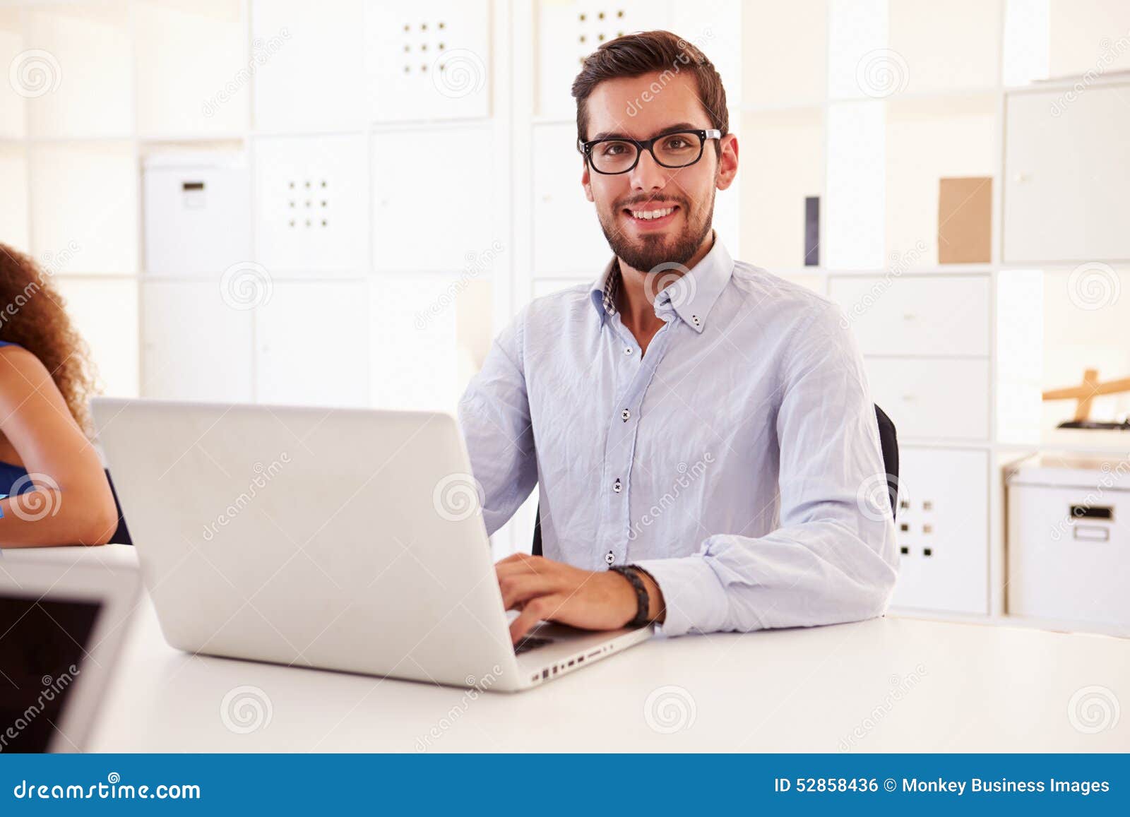 Businessman Using Laptop in Office of Start Up Business Stock Photo ...
