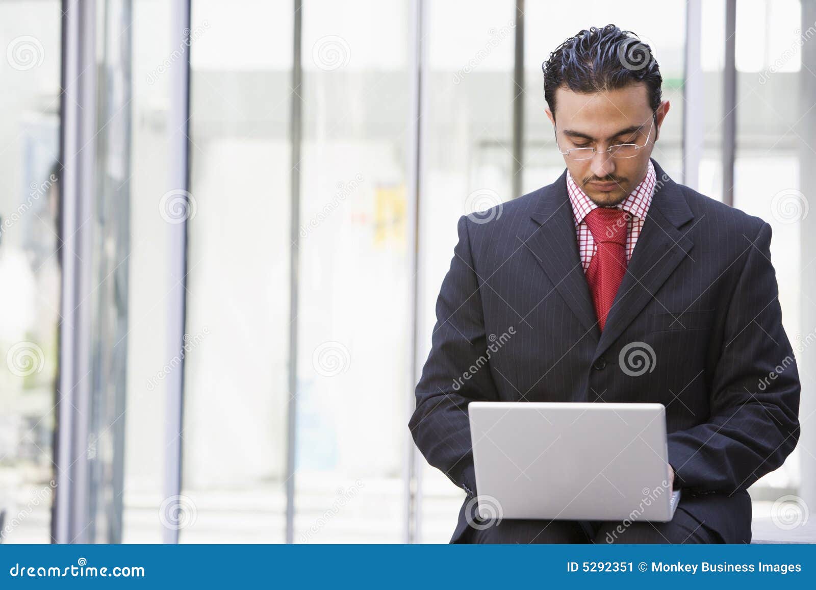 Businessman Using Laptop Outside Stock Image - Image of wireless, space ...