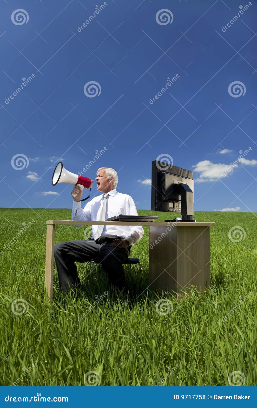 Businessman Using Megaphone in a Field Stock Photo - Image of aged ...