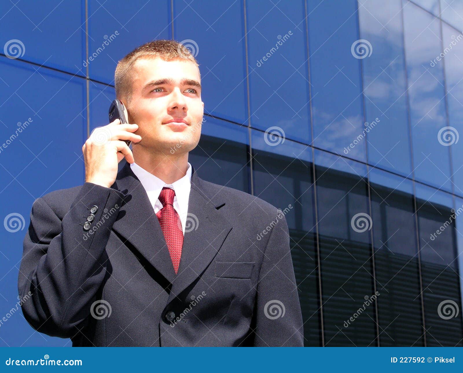 Businessman Using a Mobile Phone Stock Photo - Image of outdoors, city ...