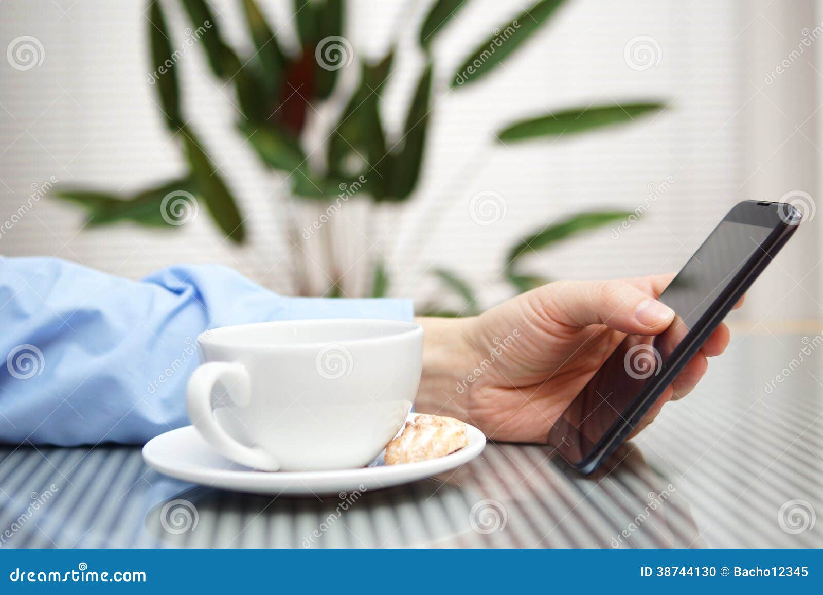 Businessman Using Mobile Phone and Drinking Coffee Stock Photo - Image ...