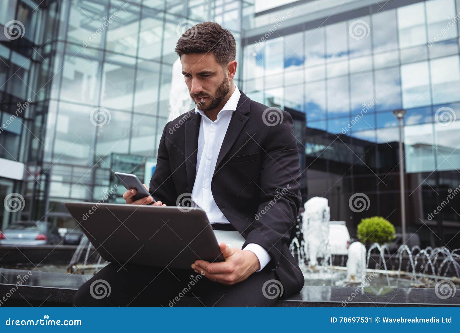 Businessman Using Mobile Phone and Laptop Stock Image - Image of adult ...