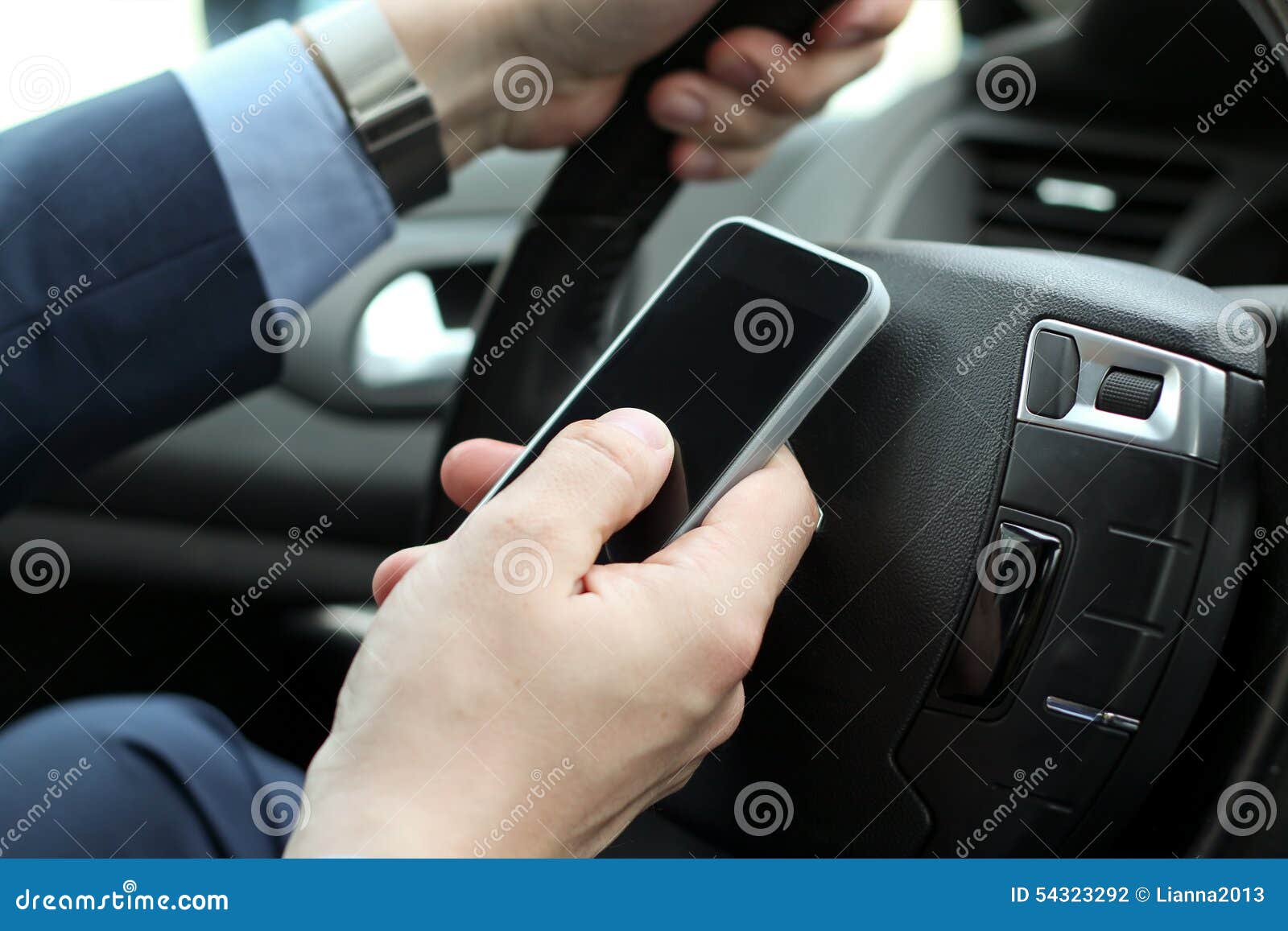 Businessman Using Mobile Smart Phone while Driving the Car Stock Photo ...