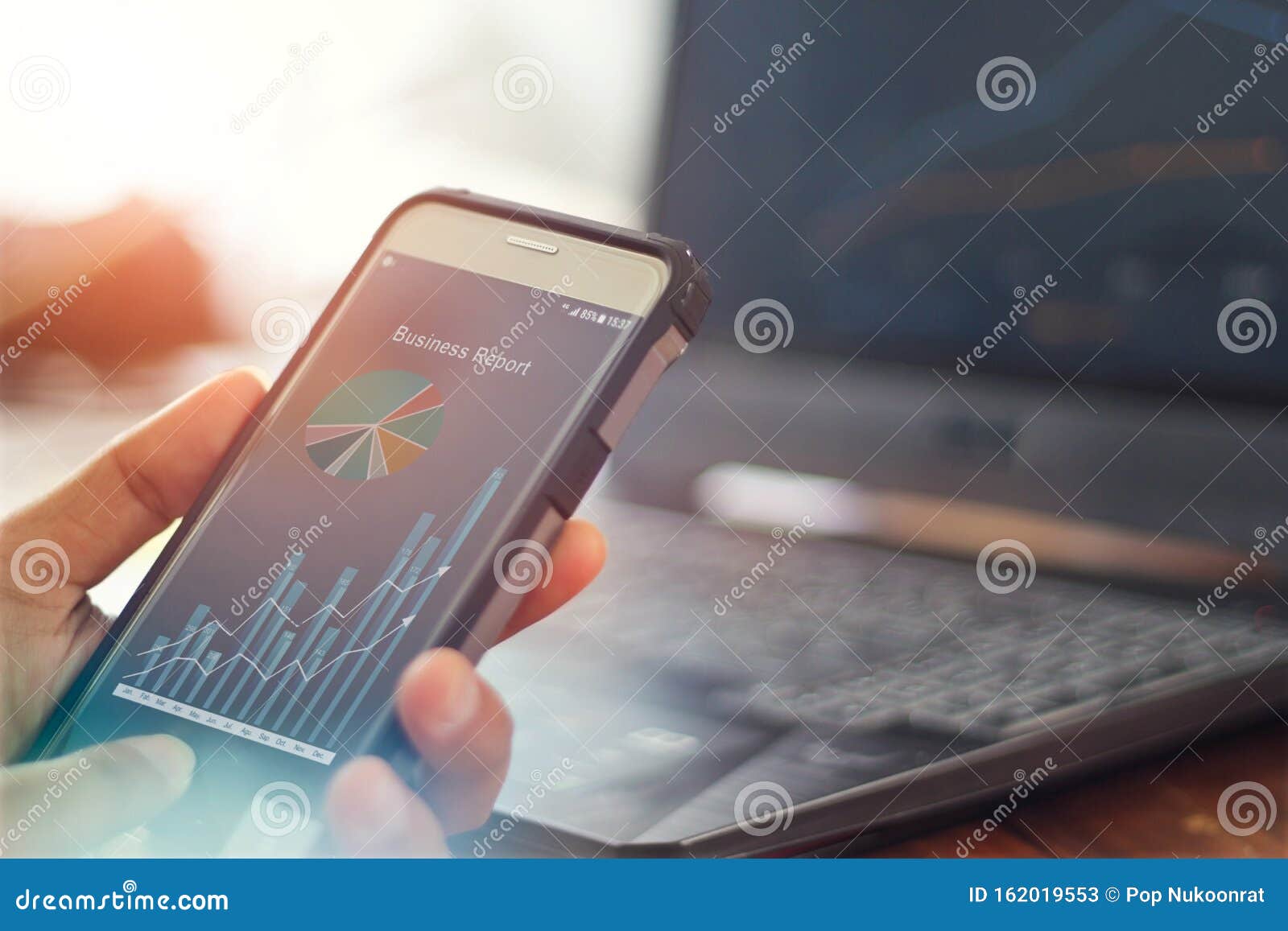 Businessman Using Mobile Smartphone Analyzing Sales Data and Economic ...