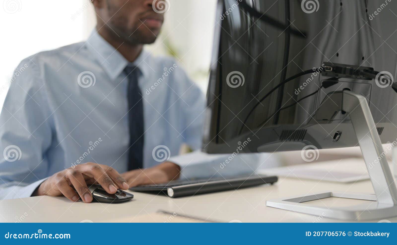 Businessman Using Mouse while Working on Desktop Stock Photo - Image of ...