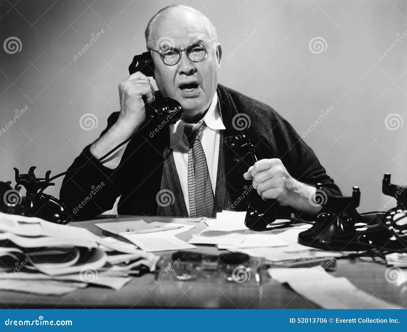 Businessman Using Multiple Phones Stock Photo - Image of employee ...