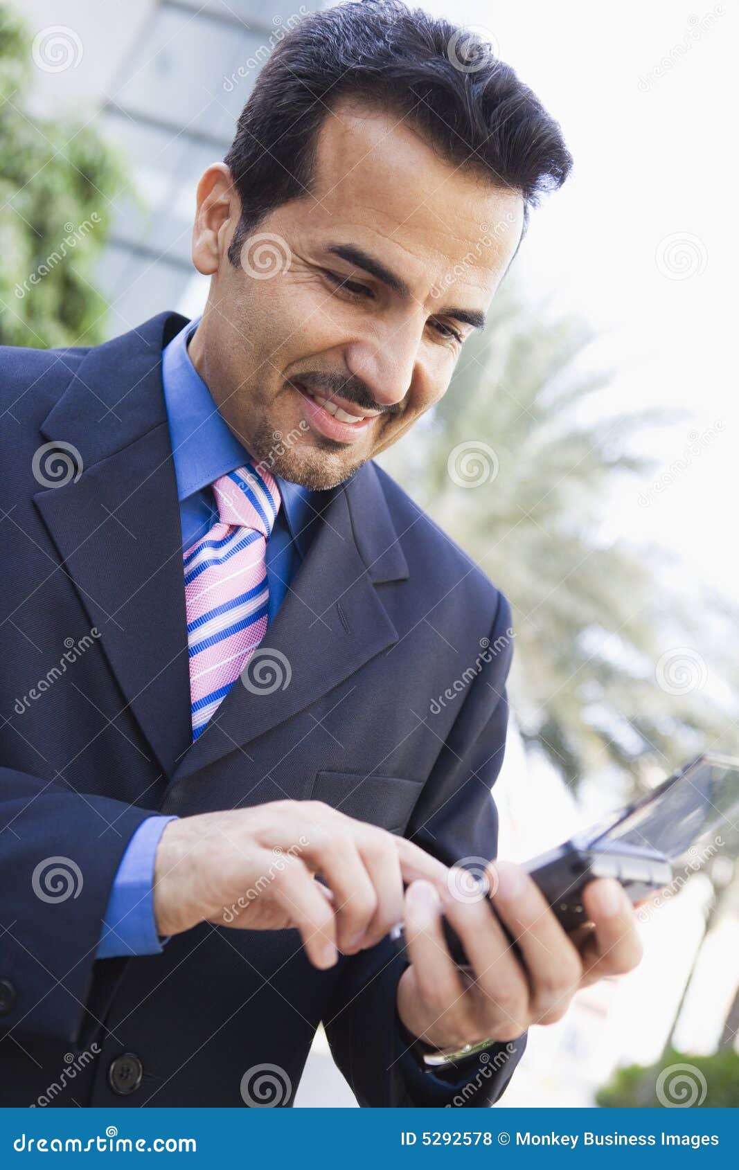 Businessman using PDA stock photo. Image of portable, vertical - 5292578