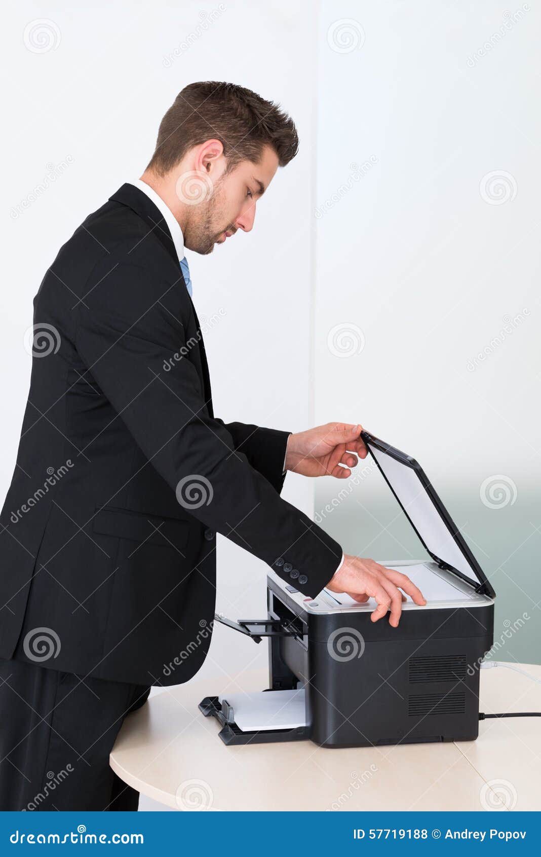 Businessman Using Photocopy Machine in Office Stock Photo - Image of ...